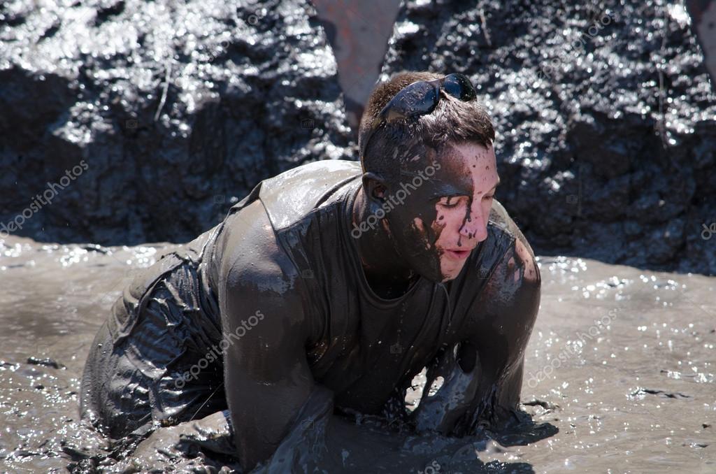 Picture: man covered in mud | Man covered in mud — Stock Photo ...