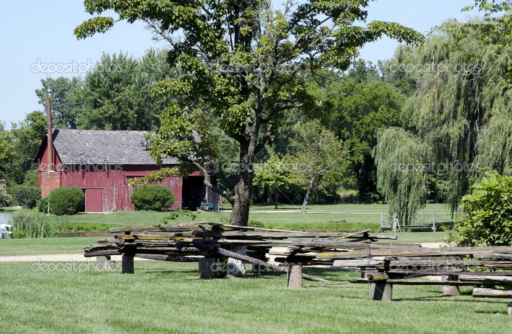 Rural farm with split rail fence Stock Photo by ©inyrdreams 38229339