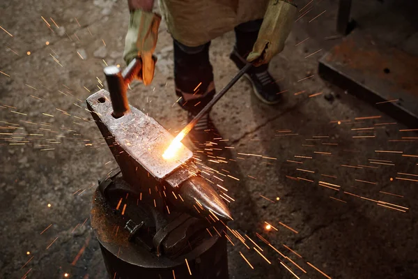 Smith forging the iron - Stock Image - Everypixel
