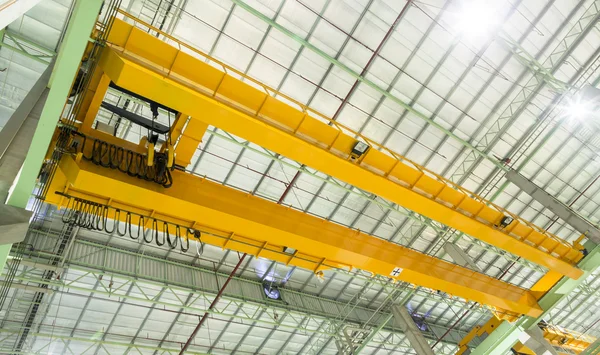 Factory overhead crane Stock Photo by ©tipchai 32785323