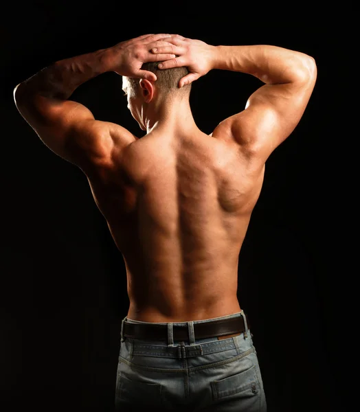 Muscular man with back neck ache — Stock Photo © shefkate #40382315