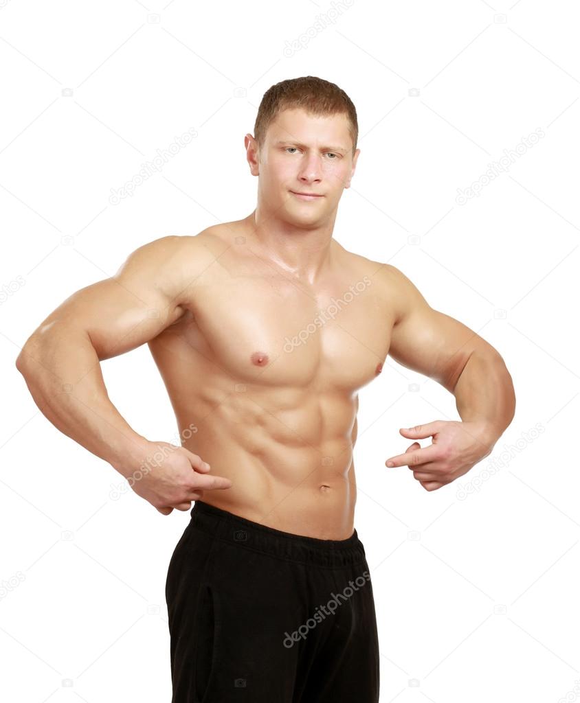Muscular young man showing abs Stock Photo by ©shefkate 34303011