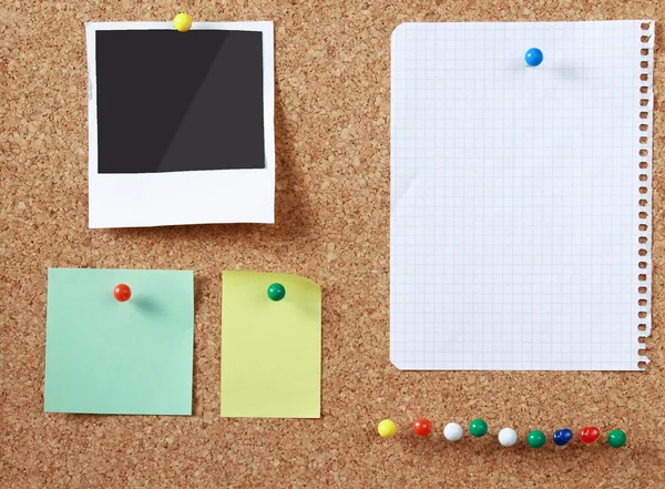 Cork notice board with blank photo and notes — Stock Photo © chrupka ...
