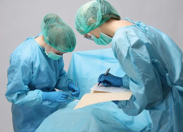 Doctors in operation Stock Photos, Royalty Free Doctors in operation ...