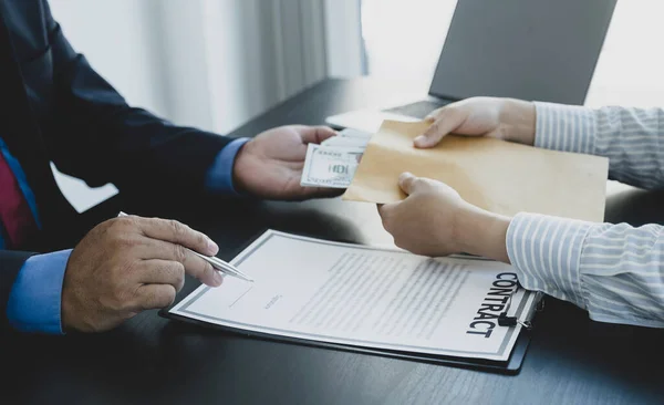 Government officials hand sign the contract and receiving bribe money ...