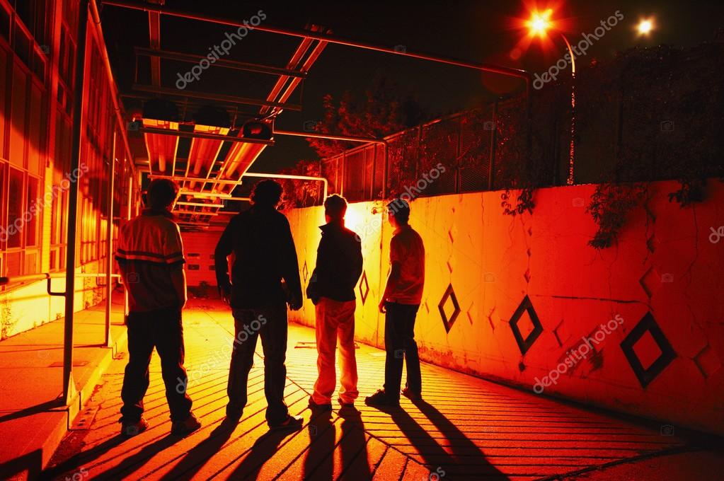 Group Hanging Out At Night — Stock Photo © DesignPicsInc #31604025