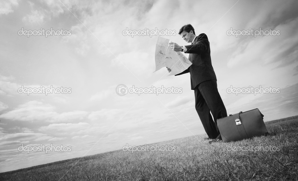 Man Reading Map Stock Photo by ©DesignPicsInc 31619395