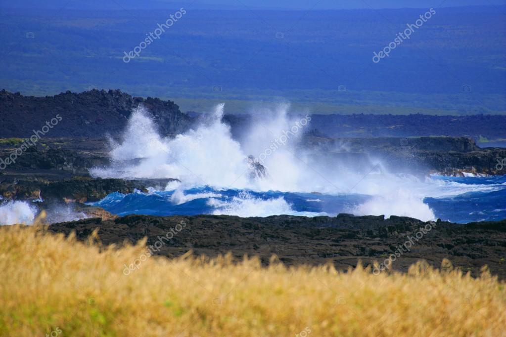Waves Hitting Rock Stock Photo by ©DesignPicsInc 31619447