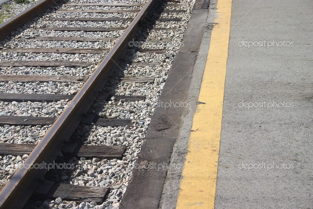 Railway Platform And Track Stock Photo by ©DesignPicsInc 31621249