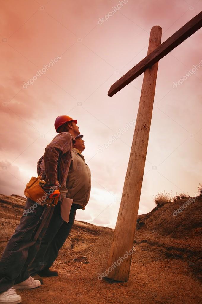 Carpenters Look At The Cross Stock Photo by ©DesignPicsInc 31681889