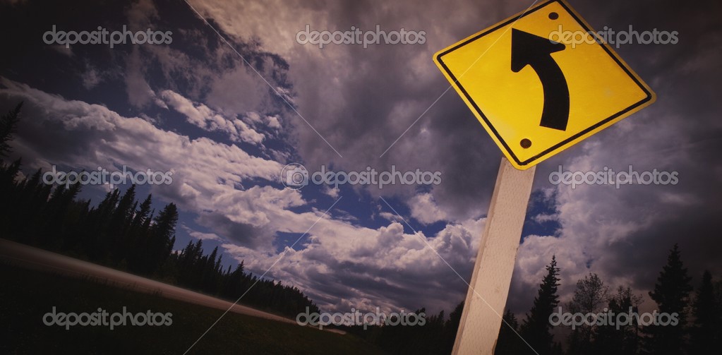 Road Sign Pointing Left Stock Photo by ©DesignPicsInc 31687003