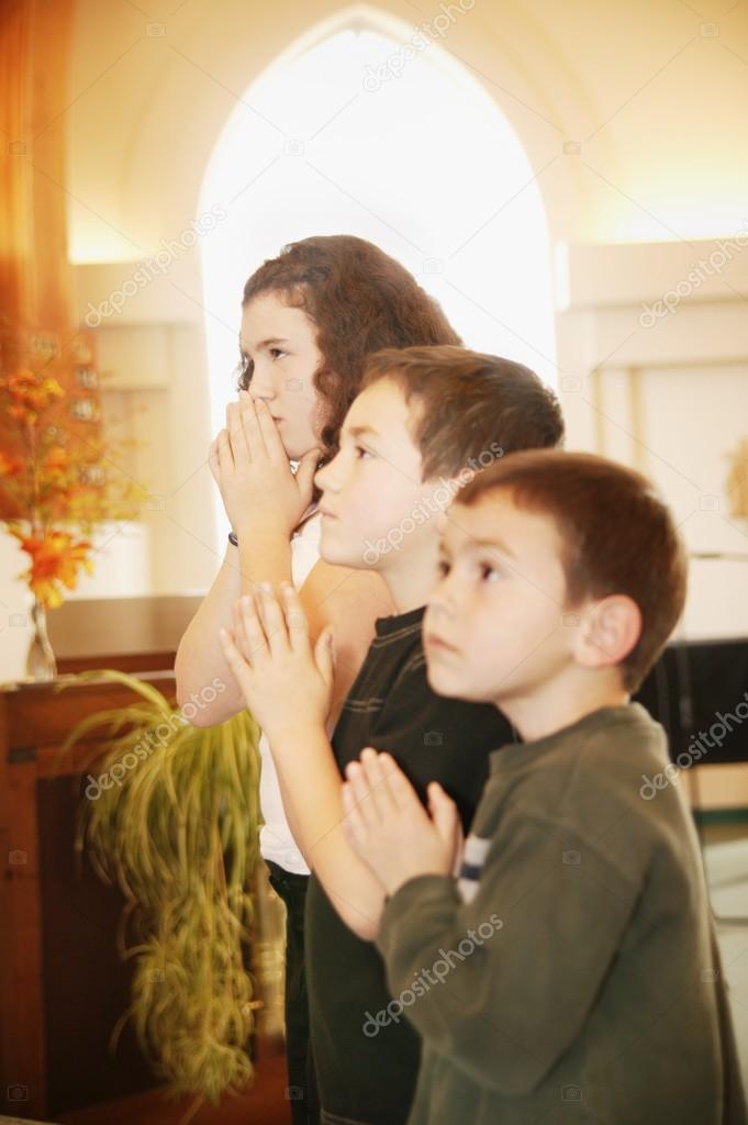 Children Praying — Stock Photo © DesignPicsInc #31694681