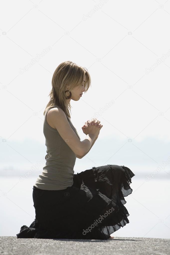 Woman Praying Stock Photo by ©DesignPicsInc 31712567