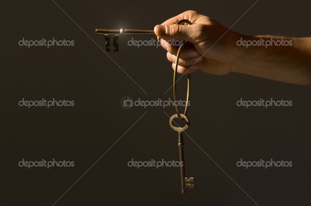Hand Holding Keys Stock Photo by ©DesignPicsInc 31714797