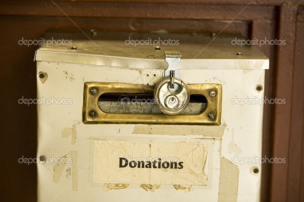 Donation Box With Lock Stock Photo by ©DesignPicsInc 31754449