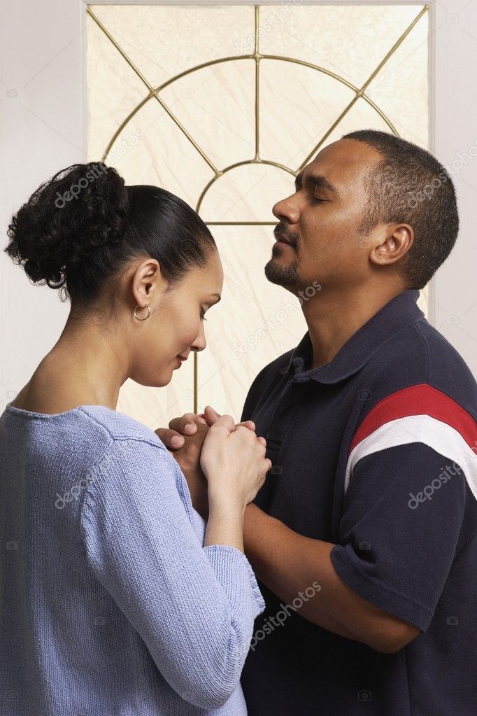 Couple Praying Together Stock Photo by ©DesignPicsInc 31755351