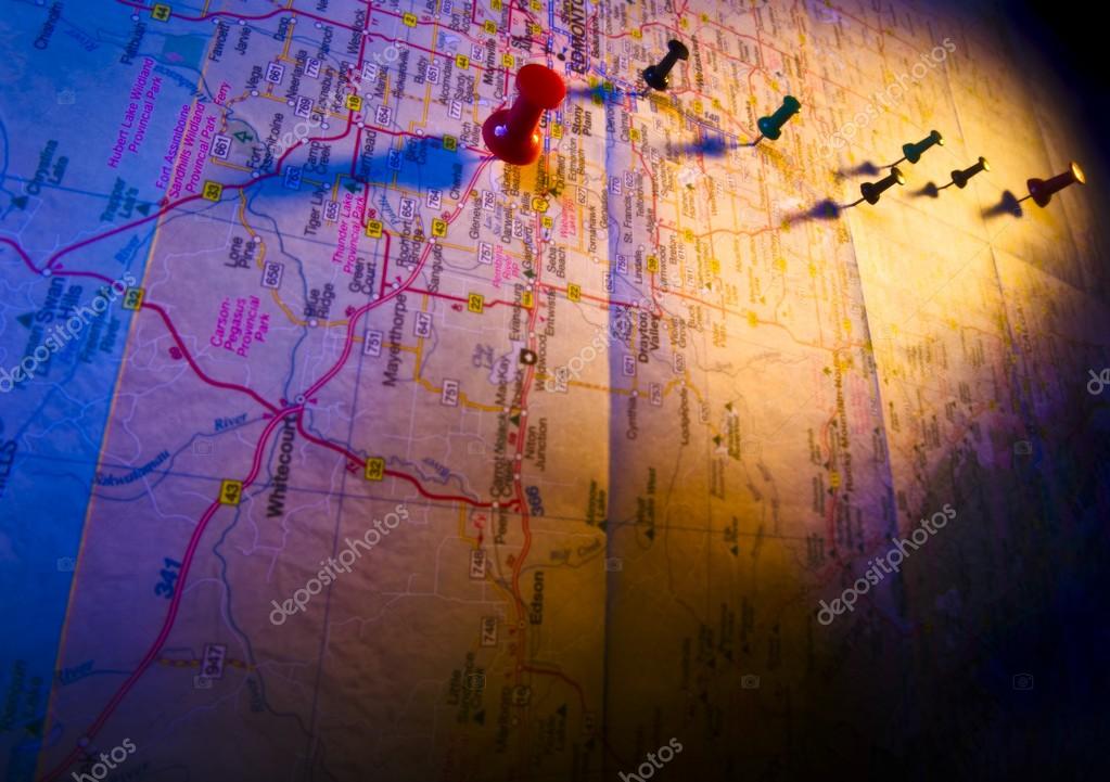 Thumb Tacks On A Map — Stock Photo © DesignPicsInc #31790817