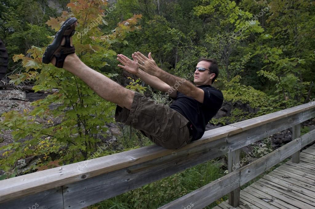 Man Stretching On Bridge, Bracebridge, Ontario, Canada — Stock Photo ...