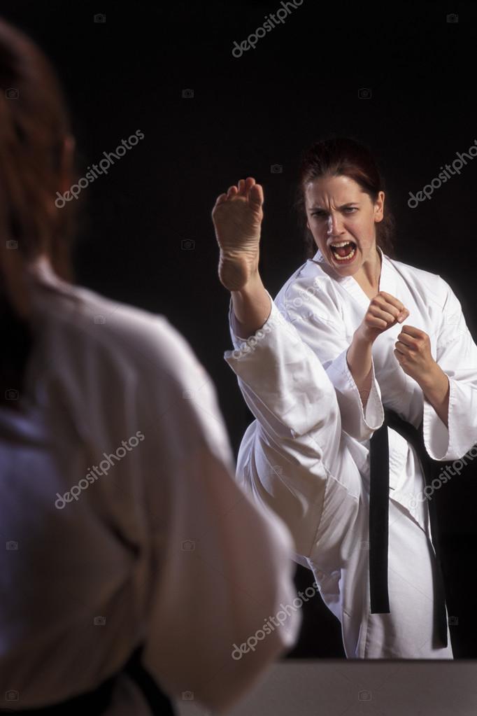 Woman doing Martial Arts — Stock Photo © DesignPicsInc #31937187