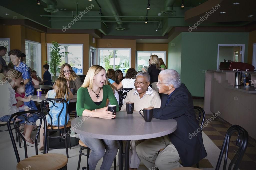 Visiting In A Coffee Shop Stock Photo by ©DesignPicsInc 31938735