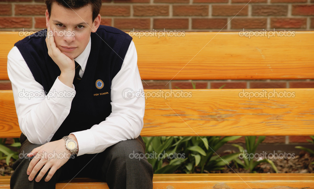Student Sitting Alone — Stock Photo © DesignPicsInc #31950169