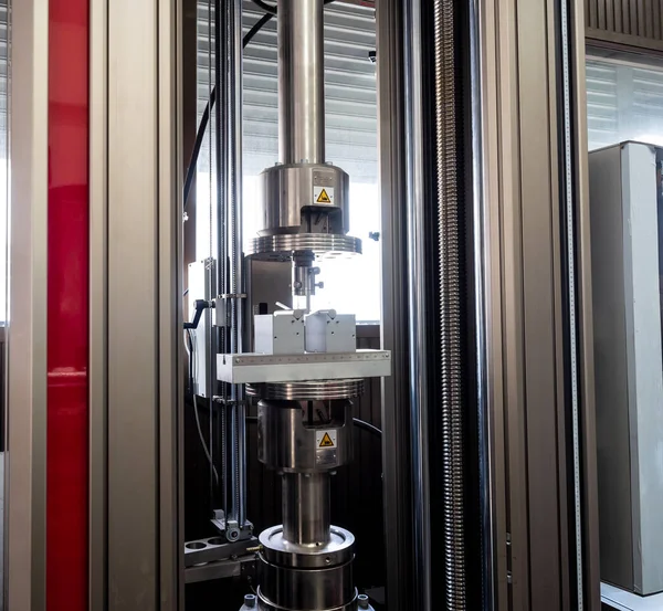 Tensile strength testing machine on laboratory Stock Photo by ©missisya ...