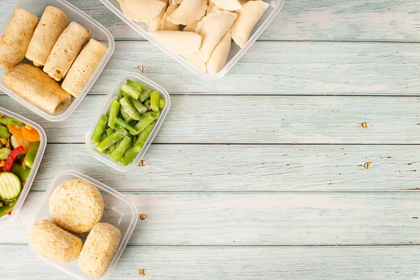 preparing food for the week. A stack of homemade meals in containers ...