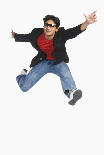 Man jumping in mid-air Stock Photo by ©imagedb_seller 32899029