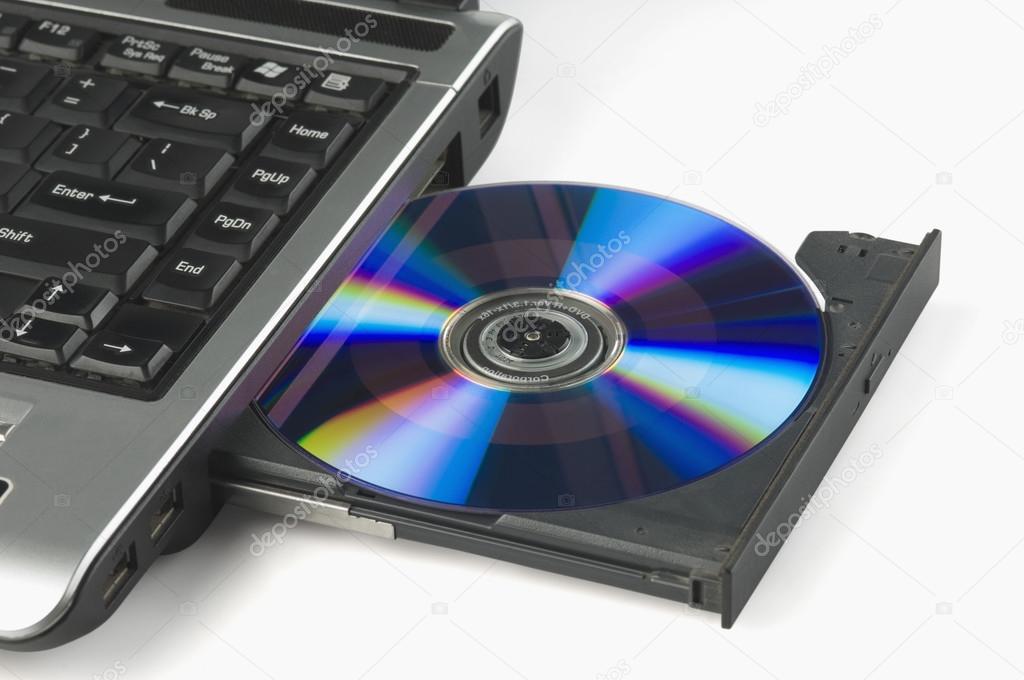 Laptop ejecting a CD — Stock Photo © imagedb_seller #32954075