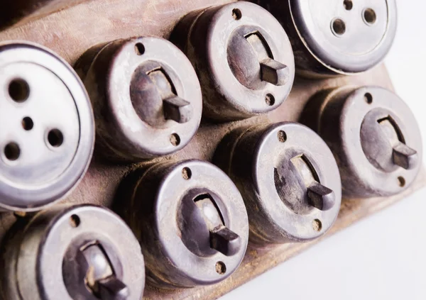 Old light switches and sockets Stock Photo by ©imagedb_seller 32962207