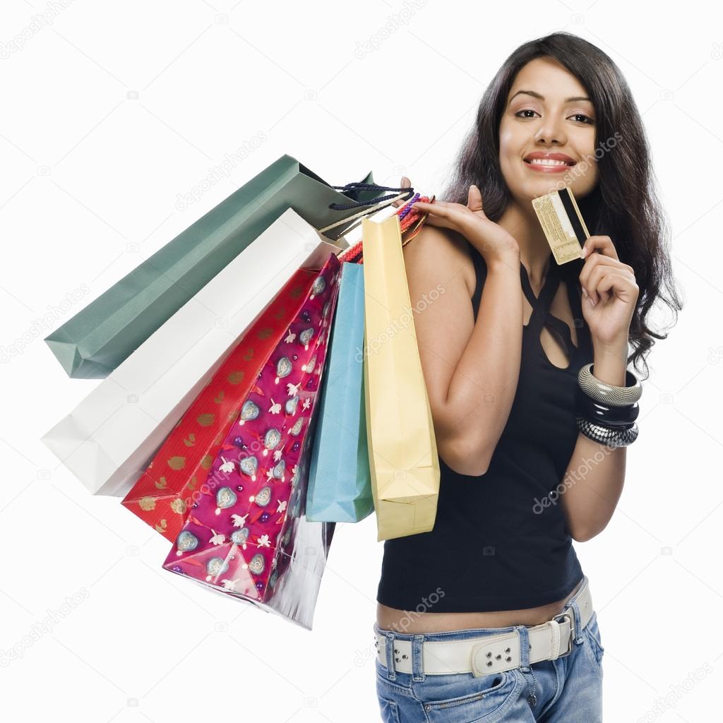 Woman holding shopping bags — Stock Photo © imagedb_seller #32962085 Woman holding shopping bags — Stock Photo © imagedb_seller #32962085