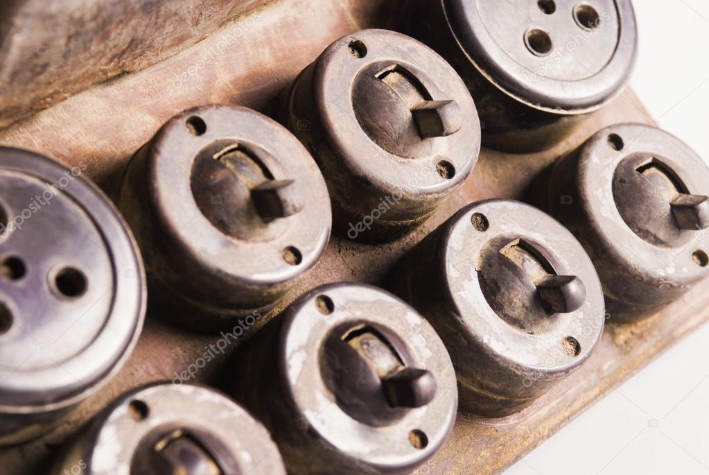 Old light switches and sockets Stock Photo by ©imagedb_seller 32962207