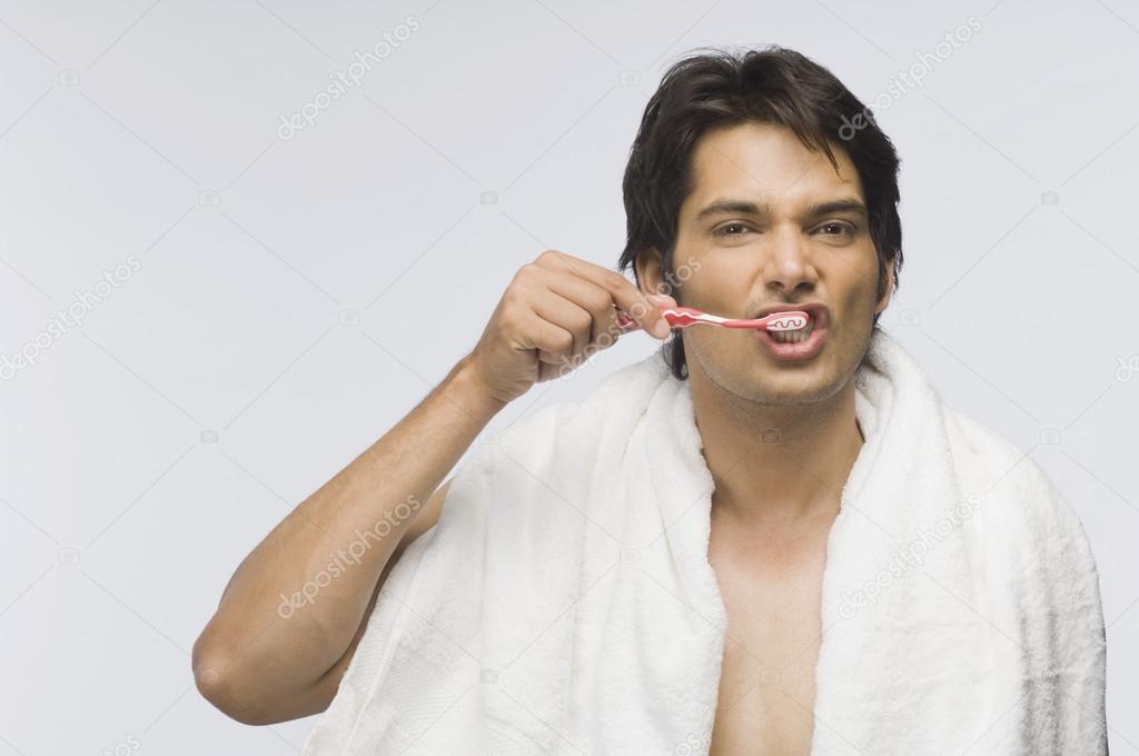 Man brushing his teeth Stock Photo by ©imagedb_seller 32962241