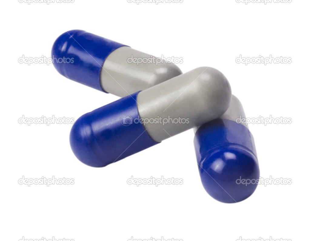 Close-up of three capsules — Stock Photo © imagedb_seller #33000537
