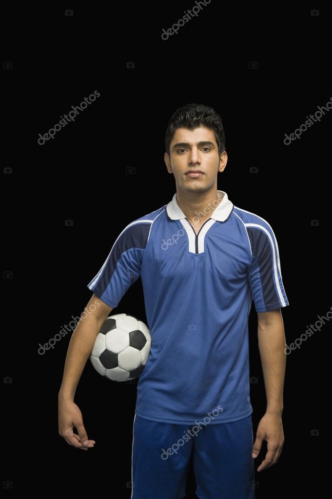 Soccer player holding a soccer ball — Stock Photo © imagedb_seller ...