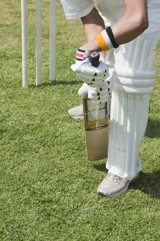Cricket batsman playing a defensive stroke — Stock Photo © imagedb ...