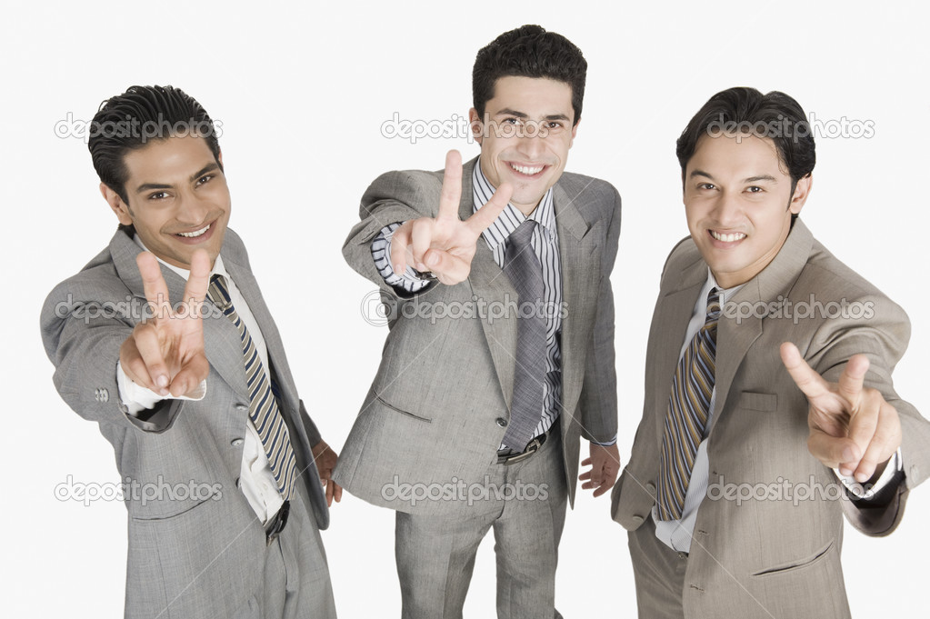 Three businessmen making peace signs Stock Photo by ©imagedb_seller ...