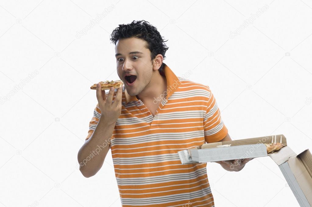 Man eating pizza — Stock Photo © imagedb_seller #33045455