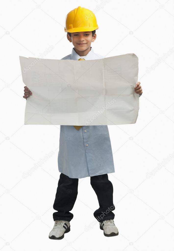 Boy dressed as an architect and showing a blueprint — Stock Photo ...