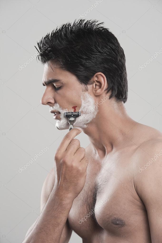 Man with shaving cut Stock Photo by ©imagedb_seller 33105457