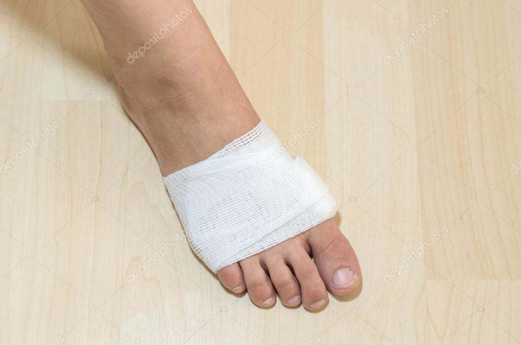White medicine bandage on injury foot Stock Photo by ©Tzido 45739871