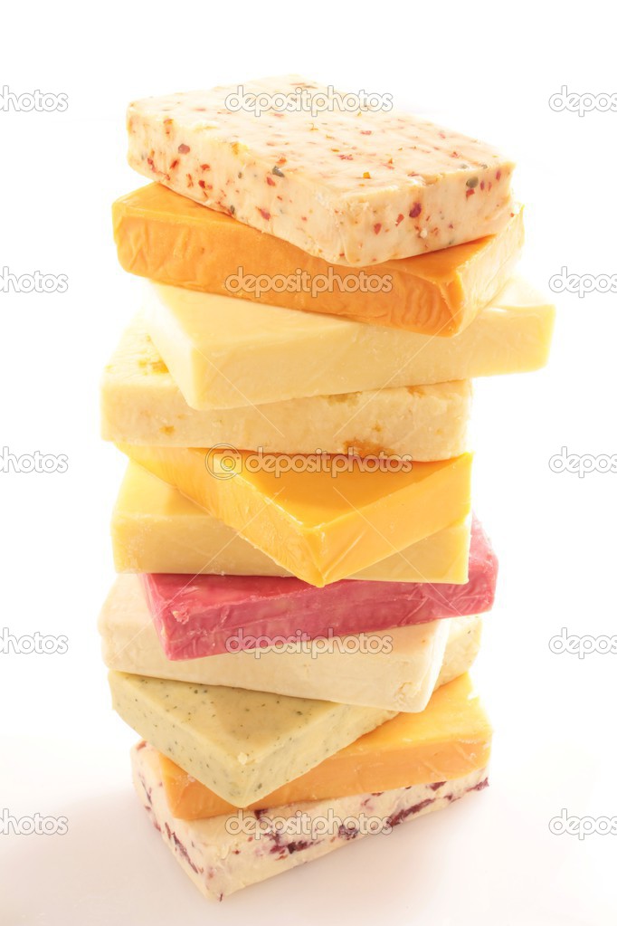 Stacked flavored cheese Stock Photo by ©neillangan 38251211