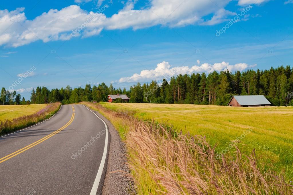 Red farm with the road, blue sky and green field Stock Photo by ©nblxer ...