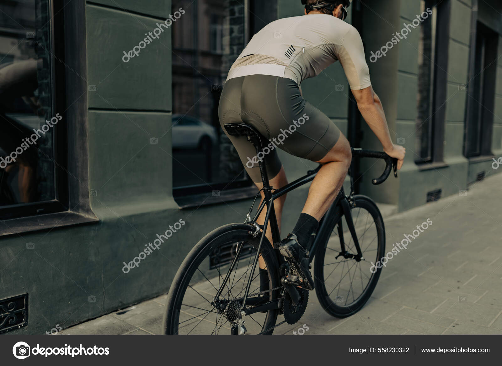 Back View Muscular Caucasian Cyclist Sport Clothes Safety Helmet Riding ...