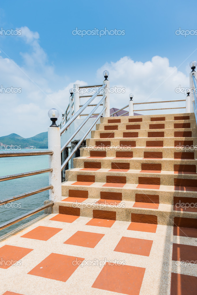 Concrete stair steps and railing Stock Photo by ©sirastockid08 44313651
