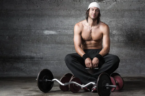 Handsome bodybuilder working out Stock Photo by ©alessandroguerr 31405205
