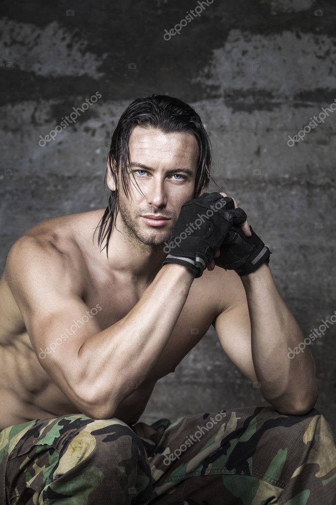 Handsome muscle athlete looking at camera Stock Photo by ...