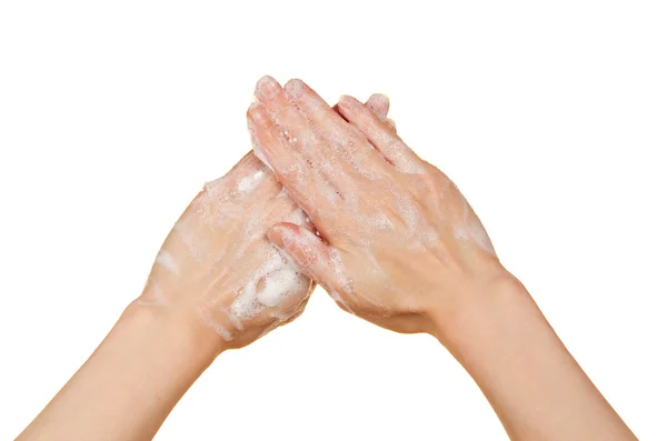 Manos de mujer en jabones, aisladas en blanco 2023