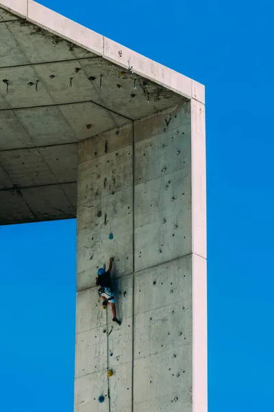 Man climbing building Stock Photos, Royalty Free Man climbing building ...