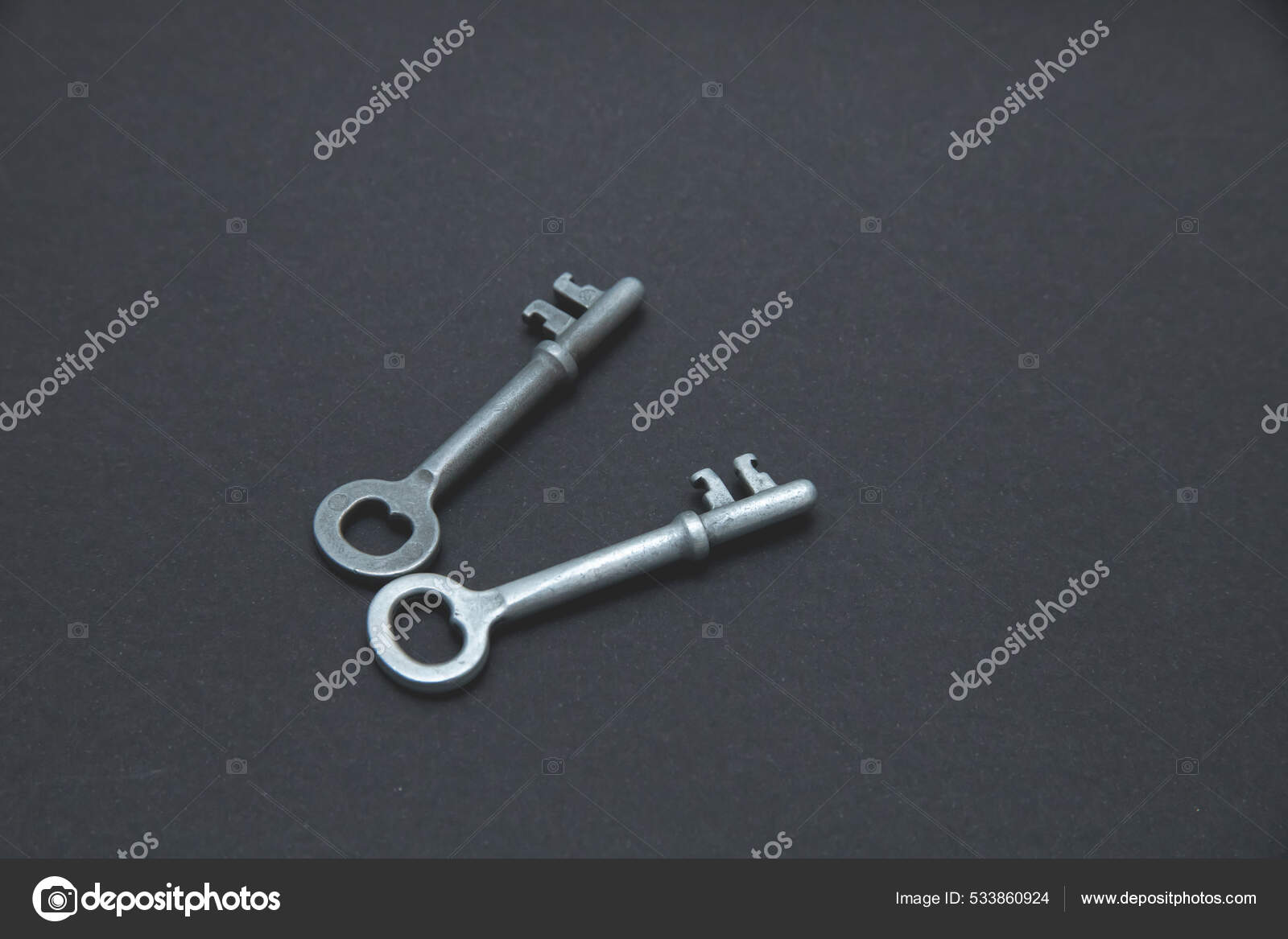Closeup Shot Two Metallic Keys Gray Surface — Stock Photo © Wirestock ...